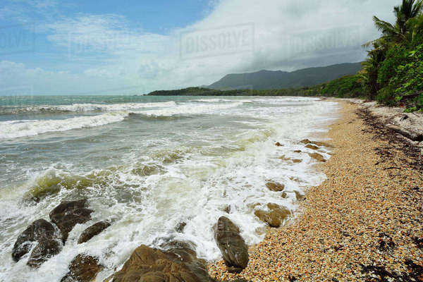 Pebble Beach with Rough Sea, Captain Cook Highway, Queensland ...