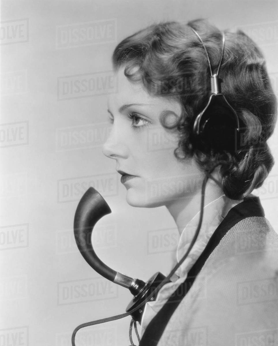 Portrait of telephone operator - Royalty-free Stock Photo | Dissolve