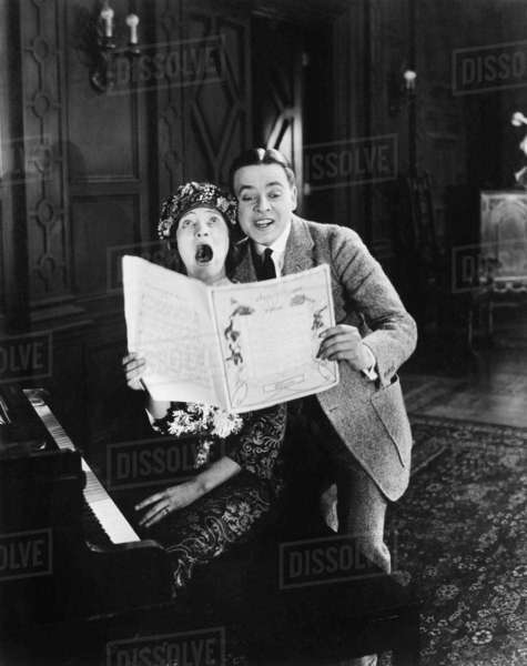 Couple singing together - Royalty-free Stock Photo | Dissolve