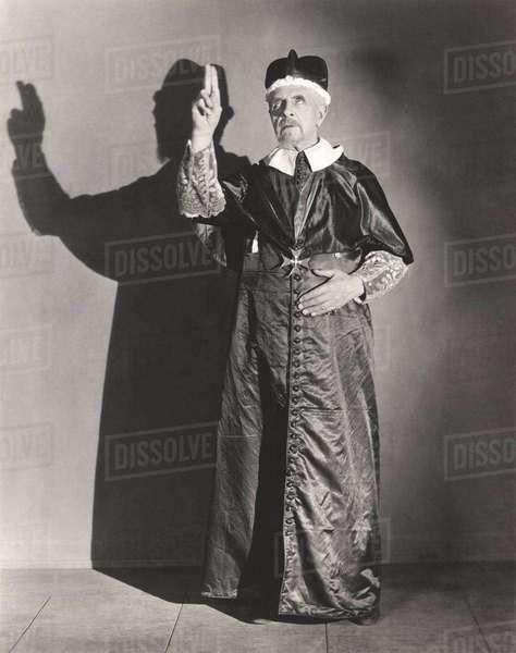 Cardinal giving a blessing - Stock Photo - Dissolve