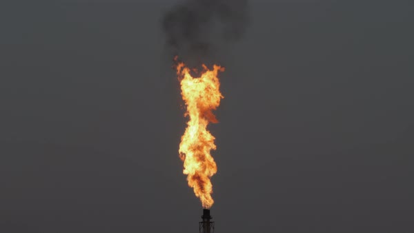 Gas flare and smoke of petrochemical refinery at twilight - Stock Video ...