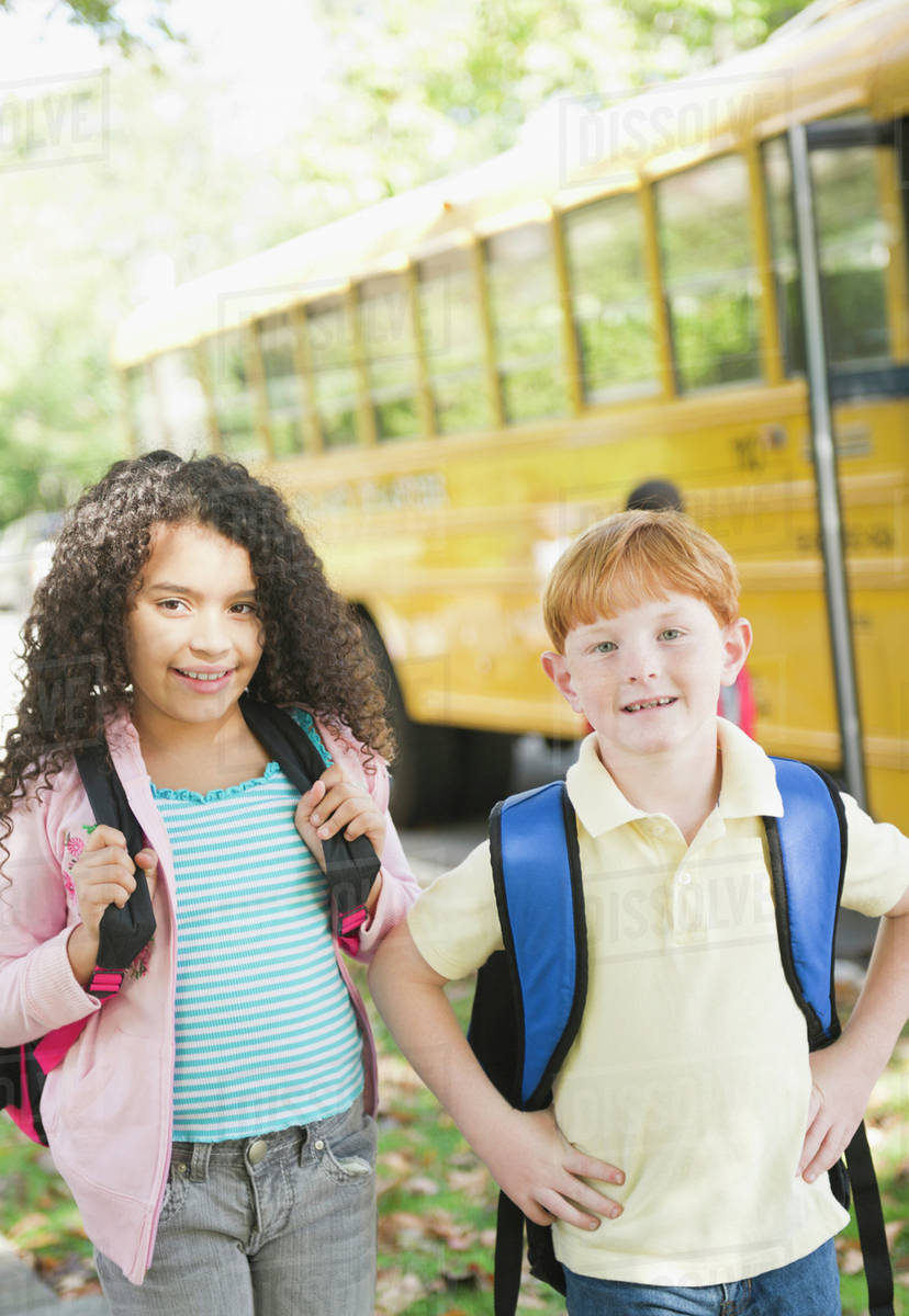 Children waiting for school bus - Royalty-free Stock Photo | Dissolve