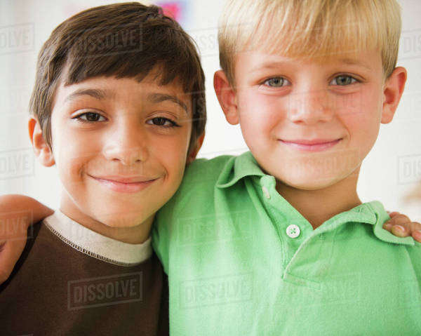 Smiling boys hugging - Royalty-free Stock Photo | Dissolve