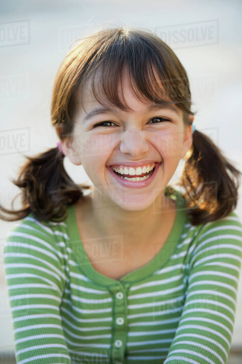 Grinning Caucasian girl - Royalty-free Stock Photo | Dissolve