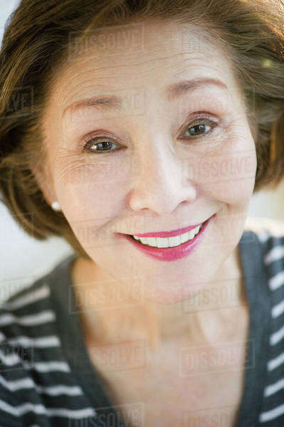 Happy Japanese woman - Stock Photo - Dissolve