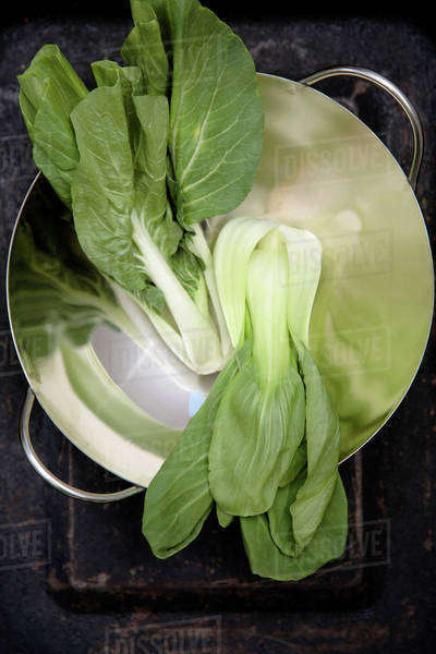 Shanghai and baby bok choy in wok - Royalty-free Stock Photo | Dissolve