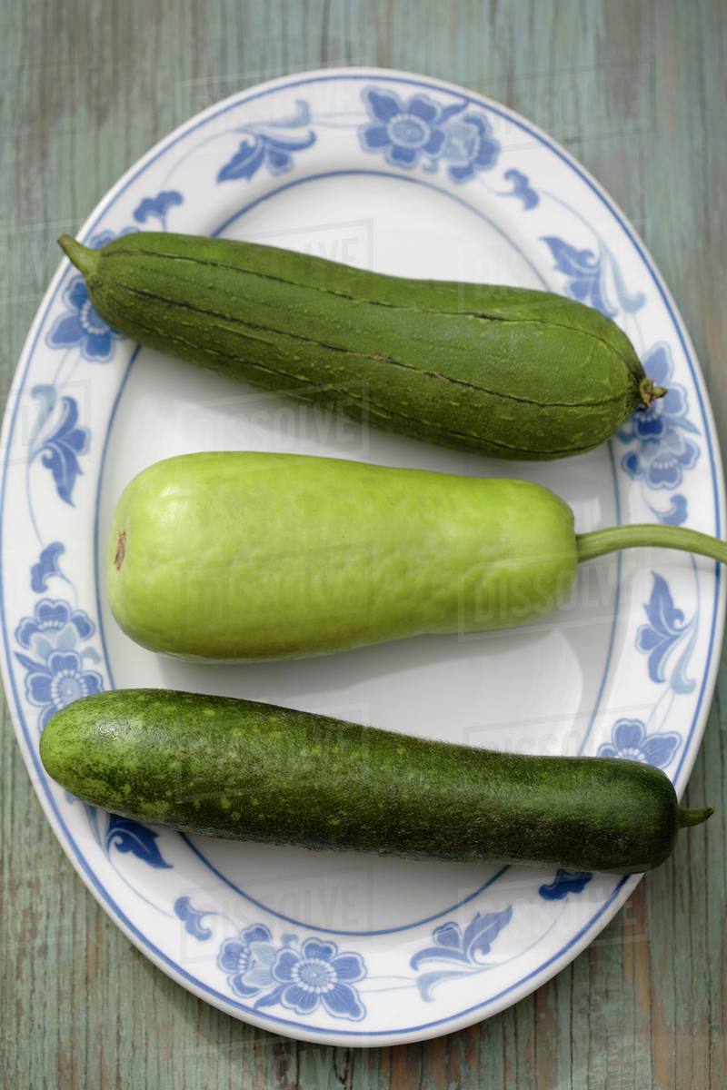 Variety of Asian squash on platter - Stock Photo - Dissolve