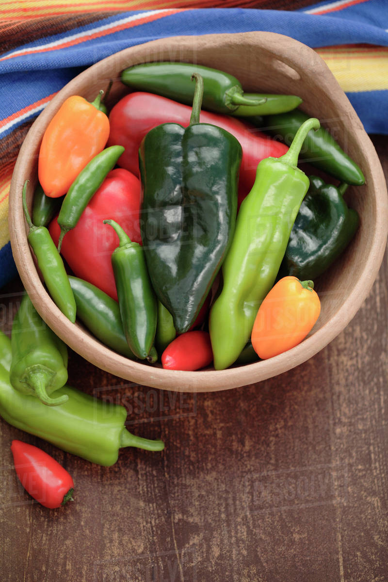 Variety of chilies in bowl - Royalty-free Stock Photo | Dissolve