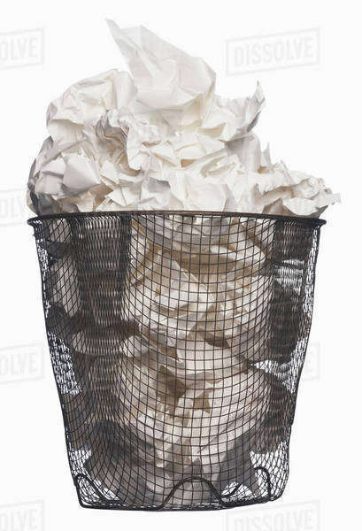 Wastepaper basket full of garbage - Royalty-free Stock Photo | Dissolve