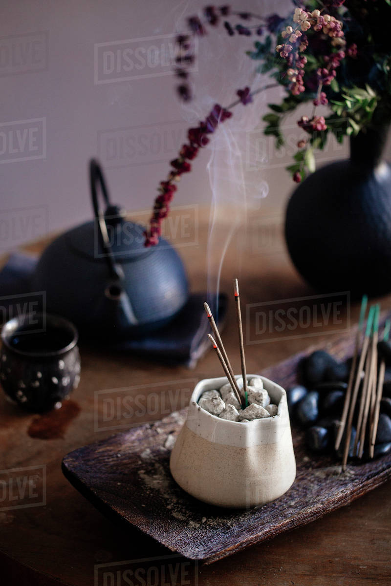 Incense burning on table - Royalty-free Stock Photo | Dissolve
