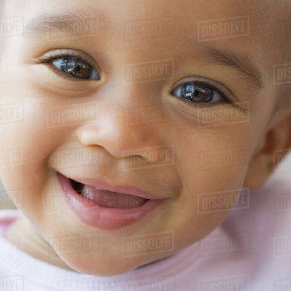 Close up of African American baby smiling - Royalty-free Stock Photo ...