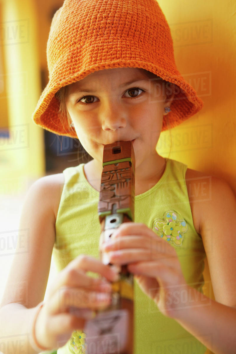 Girl playing recorder - Royalty-free Stock Photo | Dissolve