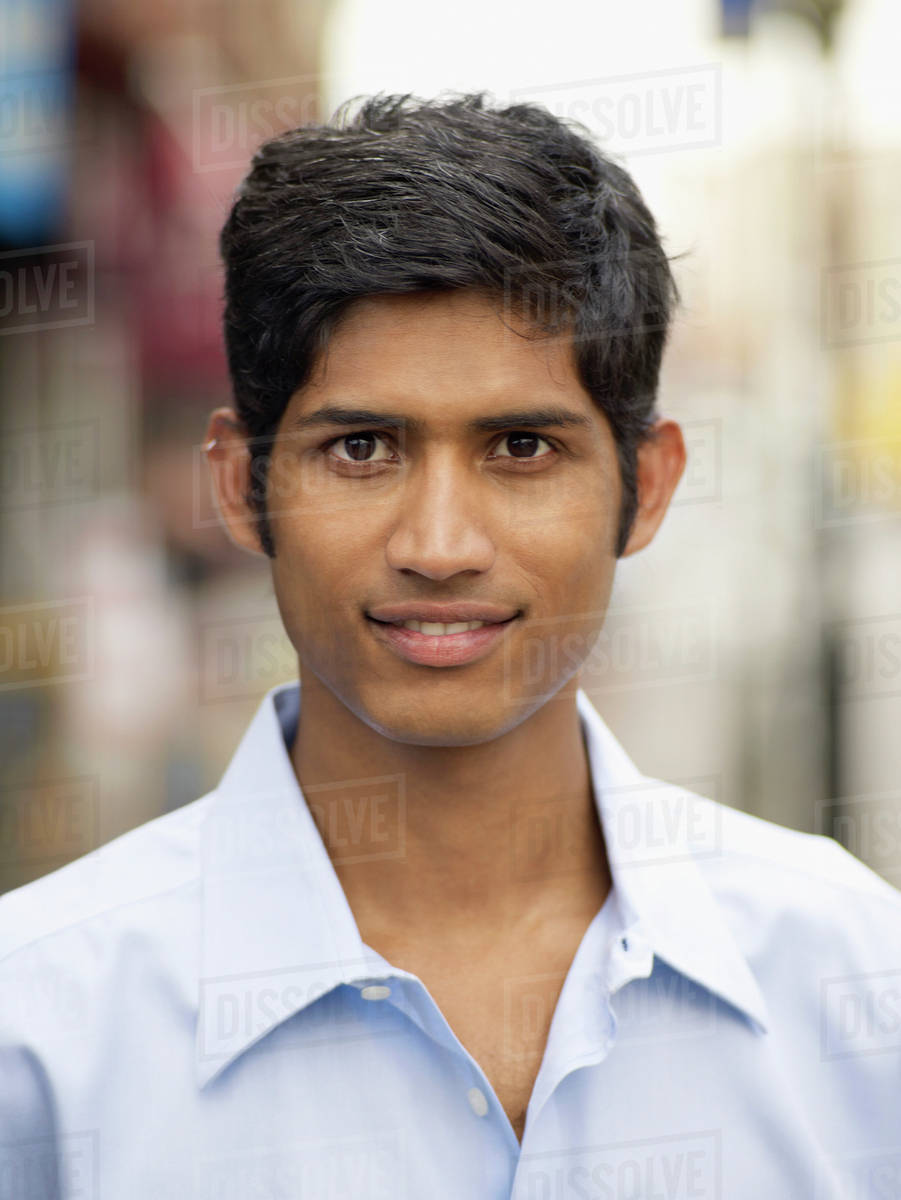 Close up of confident Indian man - Royalty-free Stock Photo | Dissolve