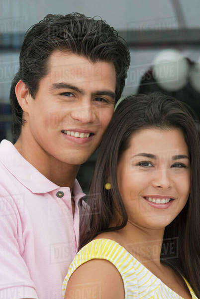 Smiling Hispanic couple - Stock Photo - Dissolve