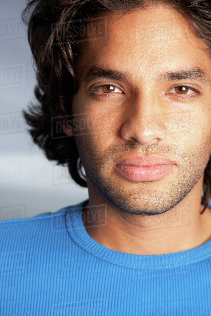 Hispanic man looking serious - Royalty-free Stock Photo | Dissolve