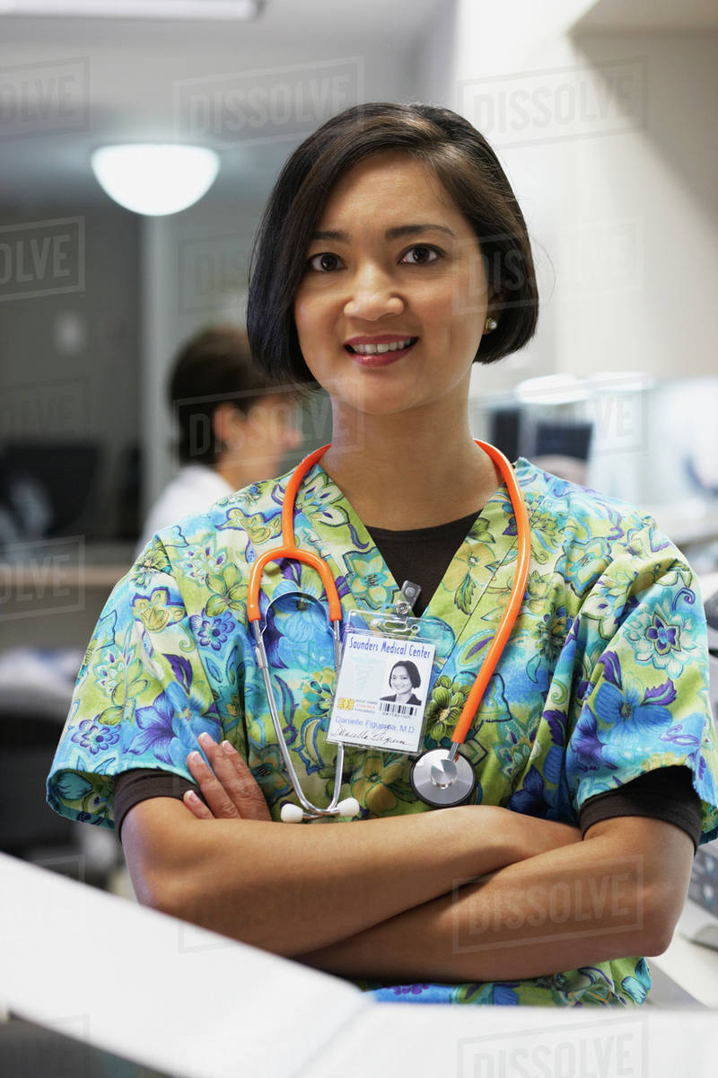 Female nurse smiling - Royalty-free Stock Photo | Dissolve