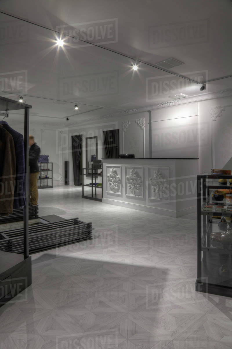 Empty counter in clothing store for men - Stock Photo - Dissolve