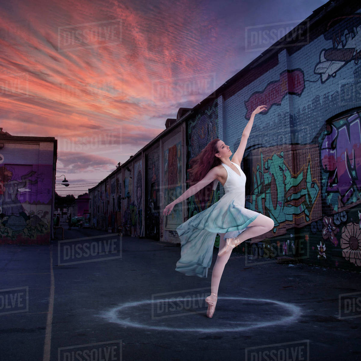 Caucasian ballerina dancing in circle - Royalty-free Stock Photo | Dissolve
