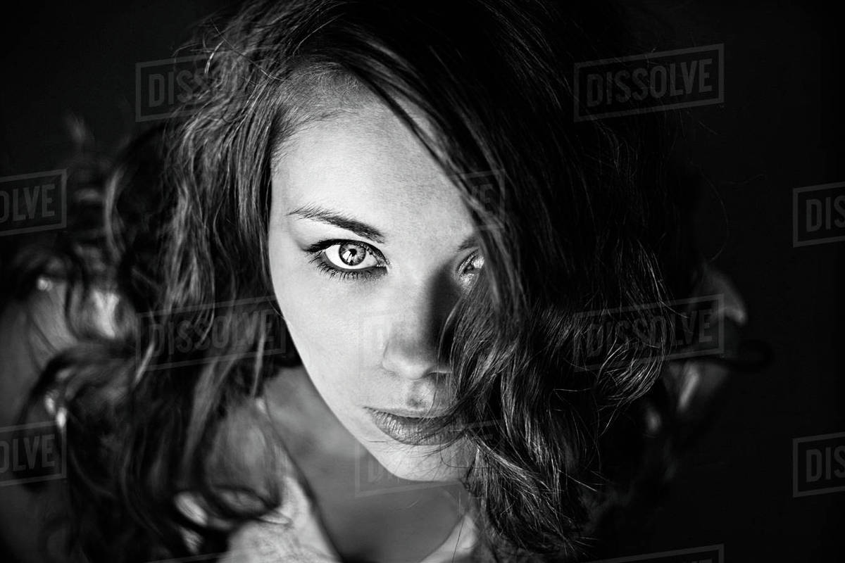 Caucasian woman with serious expression - Stock Photo - Dissolve