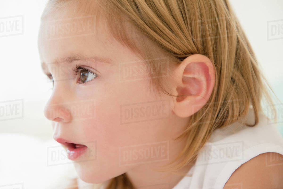 Surprised Caucasian girl staring - Royalty-free Stock Photo | Dissolve