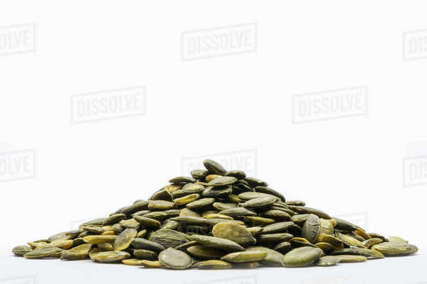 Pile of green seeds - Royalty-free Stock Photo | Dissolve