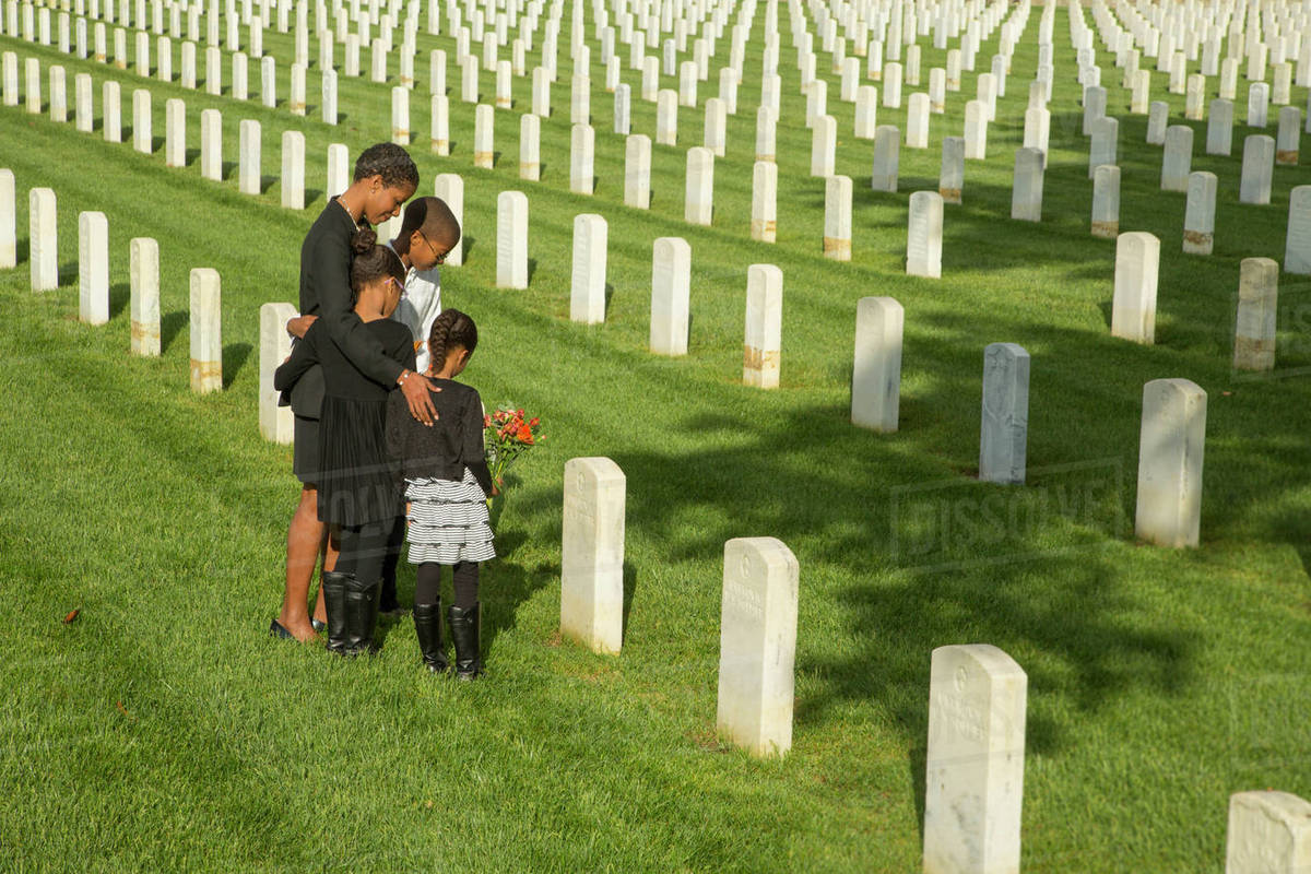 Black family at military cemetery - Royalty-free Stock Photo | Dissolve