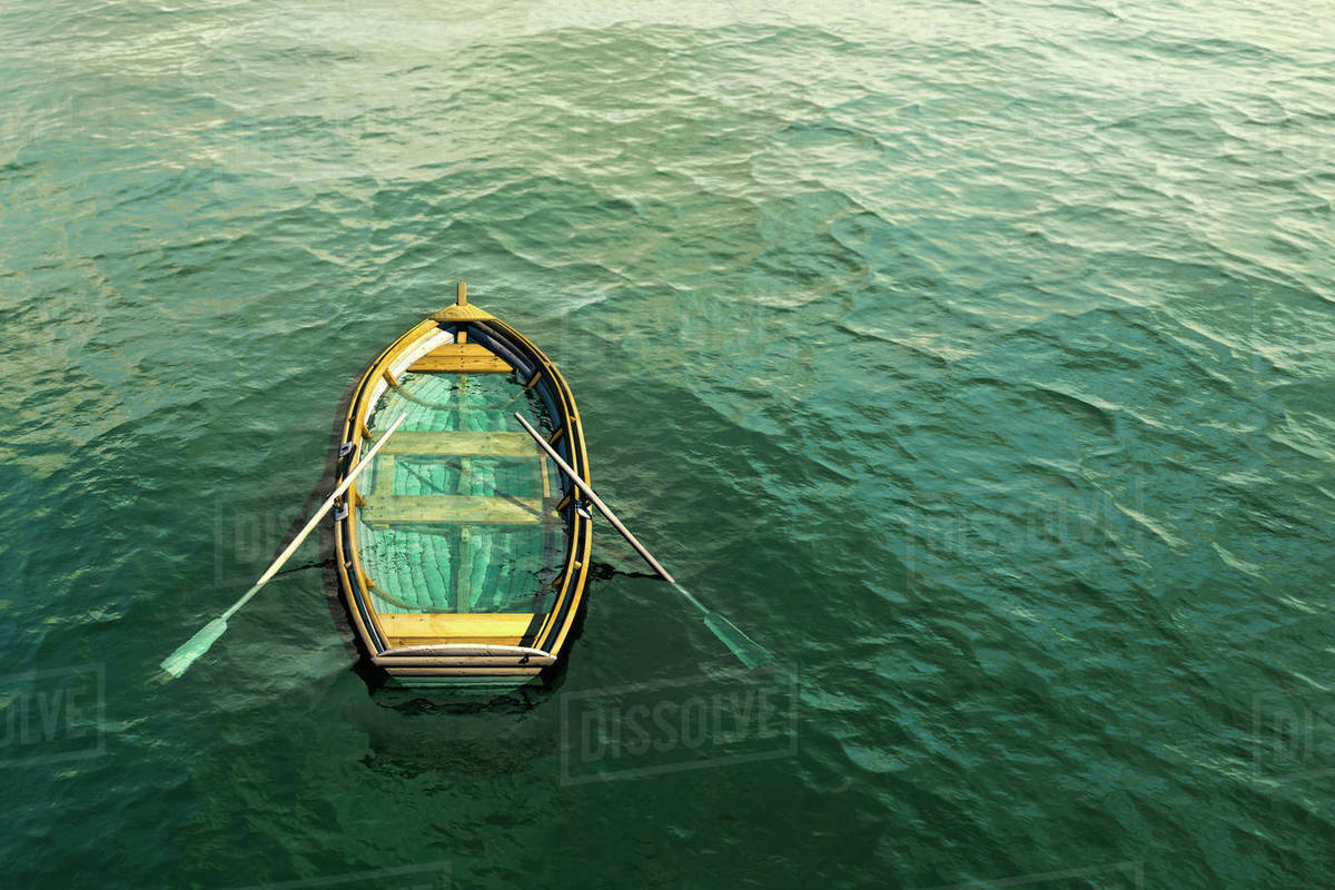 Abandoned sinking rowboat in ocean - Stock Photo - Dissolve