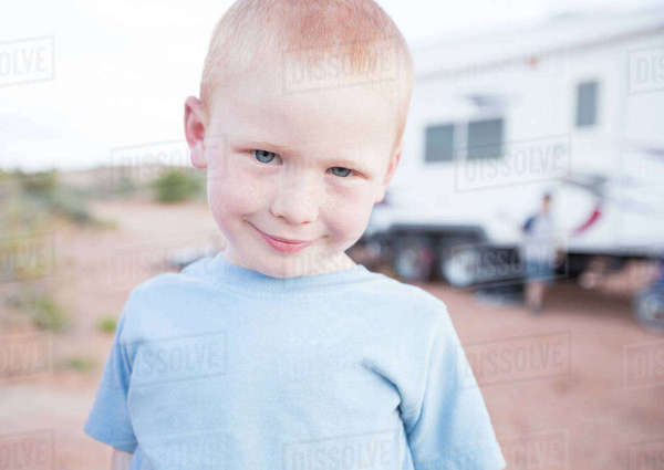 Caucasian boy smiling - Royalty-free Stock Photo | Dissolve