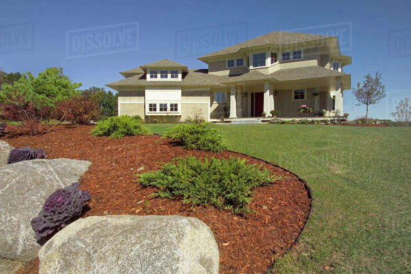 Exterior of a single family home with lawn in front - Royalty-free ...