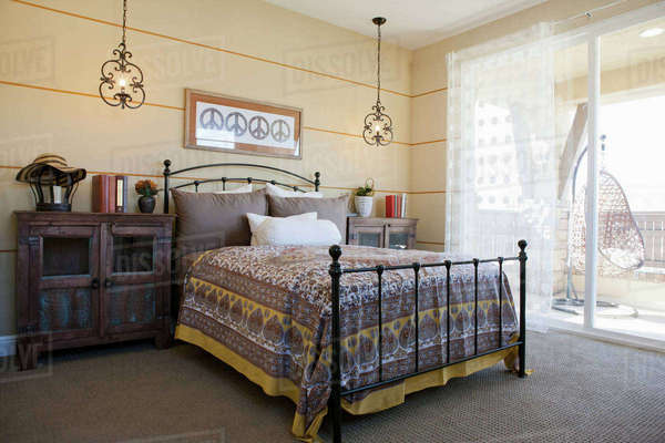 Interior of middle class bedroom - Royalty-free Stock Photo | Dissolve