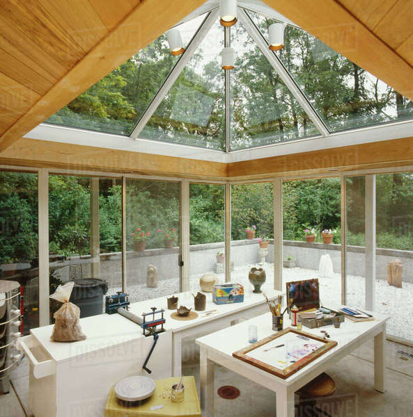 Cedar tongue and groove ceiling with glass sliding doors and skylights ...