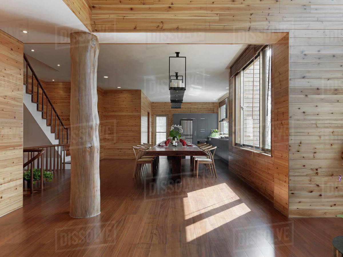 Large wooden dining table in cabin home - Royalty-free Stock Photo ...