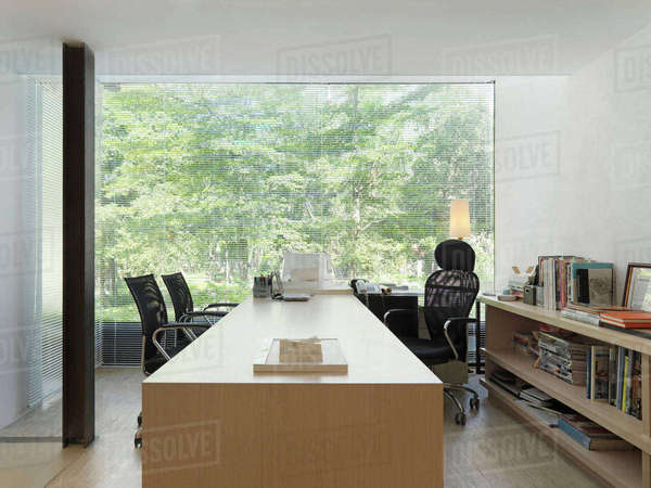 Large desk in modern office - Royalty-free Stock Photo | Dissolve