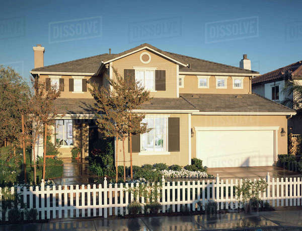 Front Exterior of Traditional Home - Royalty-free Stock Photo | Dissolve
