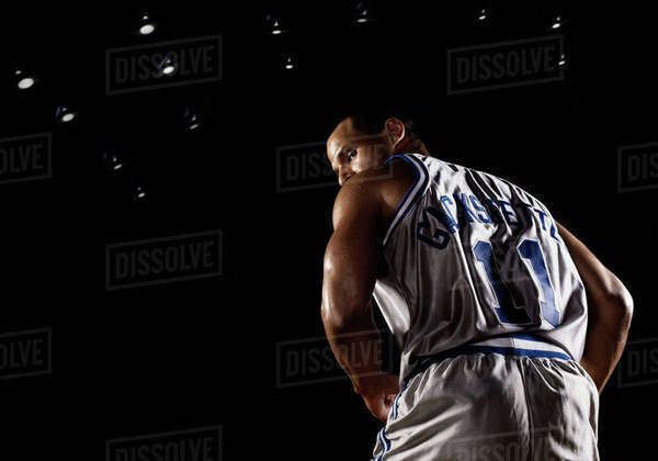 Mixed race basketball player - Stock Photo - Dissolve
