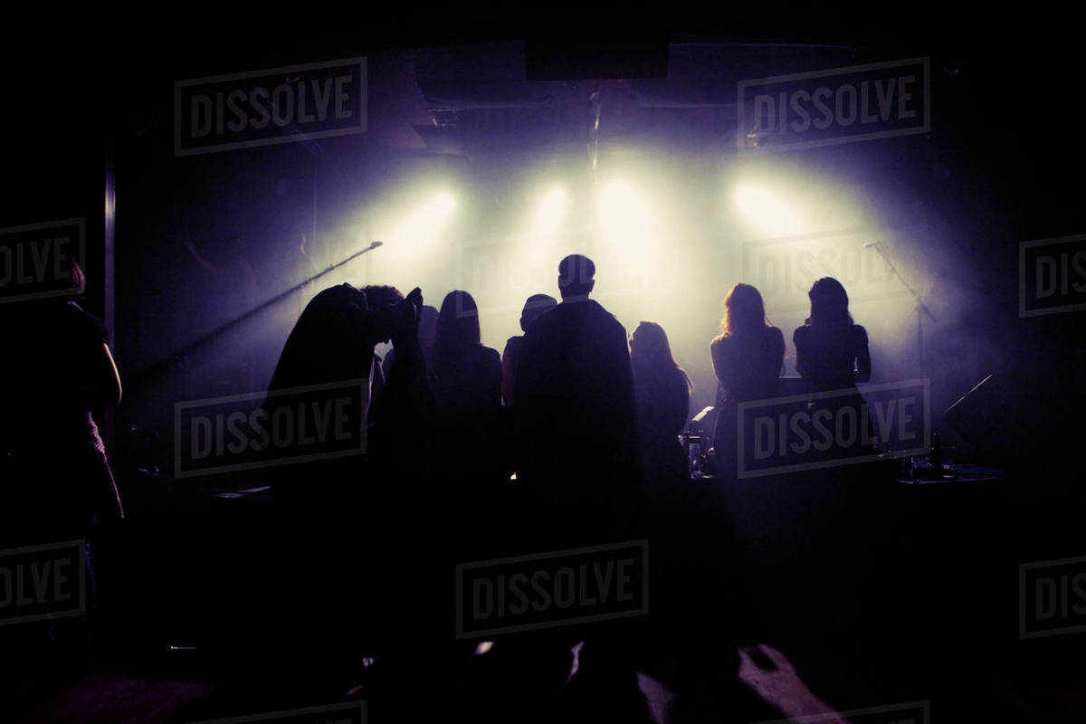 People socializing in nightclub - Royalty-free Stock Photo | Dissolve