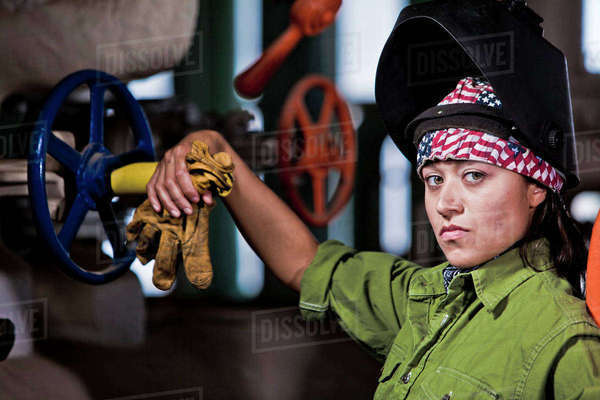 Serious Hispanic welder - Royalty-free Stock Photo | Dissolve