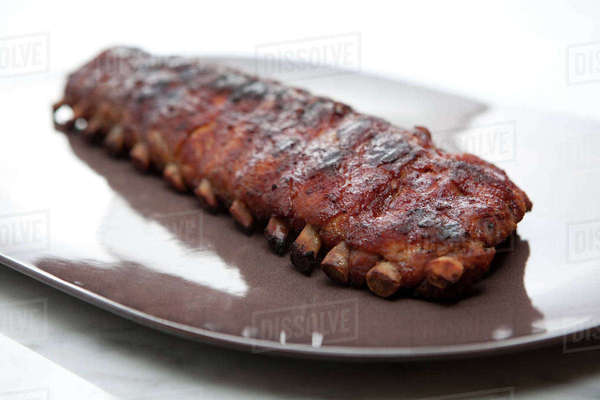 Pork ribs on platter - Royalty-free Stock Photo | Dissolve
