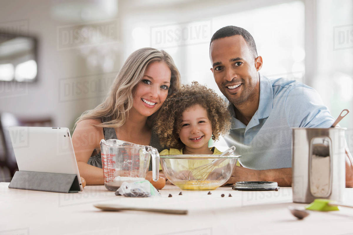 Family baking together - Royalty-free Stock Photo | Dissolve