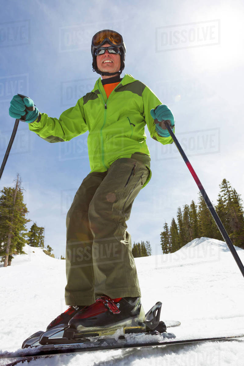 Caucasian man skiing - Royalty-free Stock Photo | Dissolve