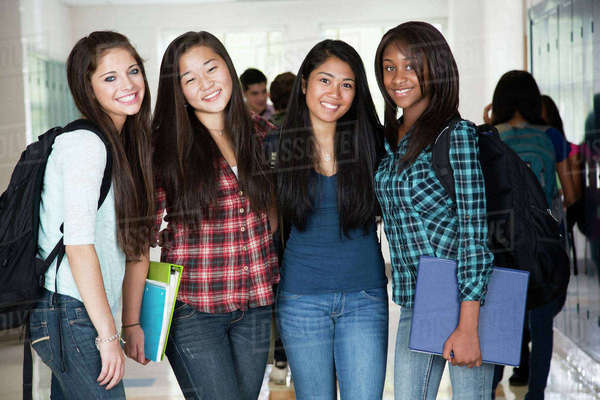 High school friends standing in corridor together - Royalty-free Stock ...