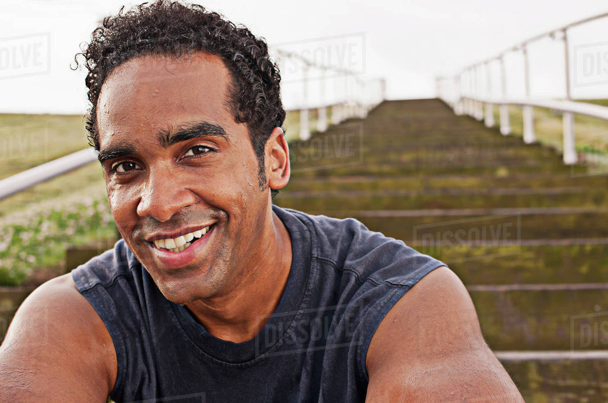 Smiling mixed race man - Royalty-free Stock Photo | Dissolve