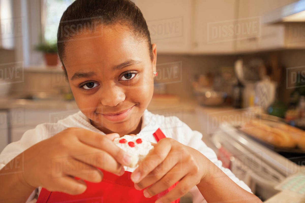 African American girl baking in kitchen - Royalty-free Stock Photo ...