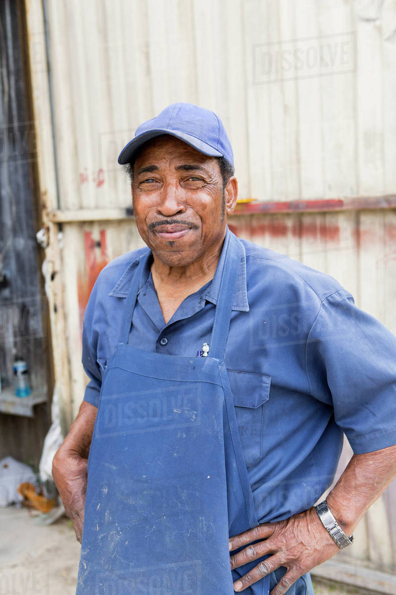 African American worker smiling - Royalty-free Stock Photo | Dissolve
