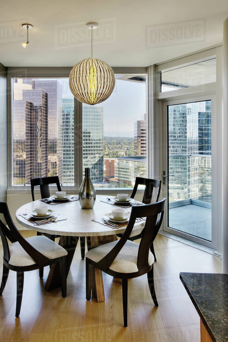 Dining room in luxury highrise apartment - Royalty-free Stock Photo ...