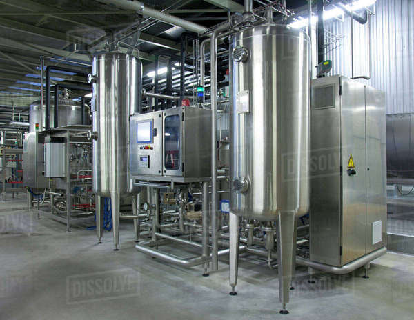 Stainless steel machinery in factory - Stock Photo - Dissolve