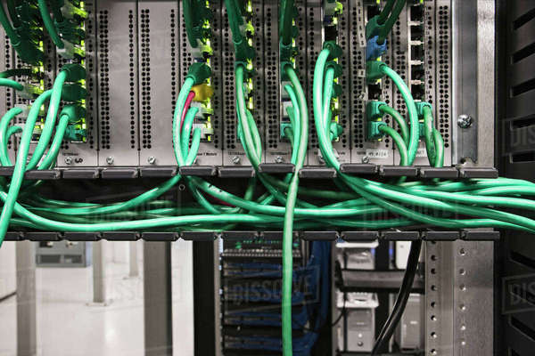 Close up of computer cords - Stock Photo - Dissolve