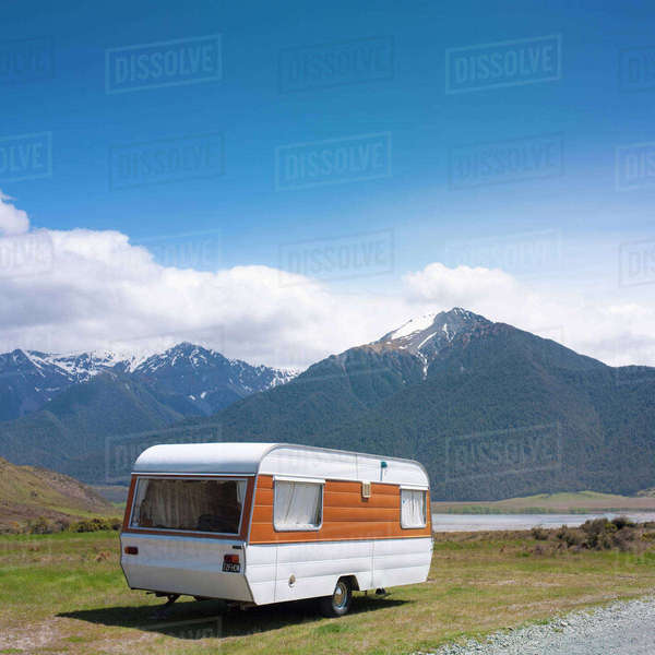Caravan in Mountains Landscape - Royalty-free Stock Photo | Dissolve