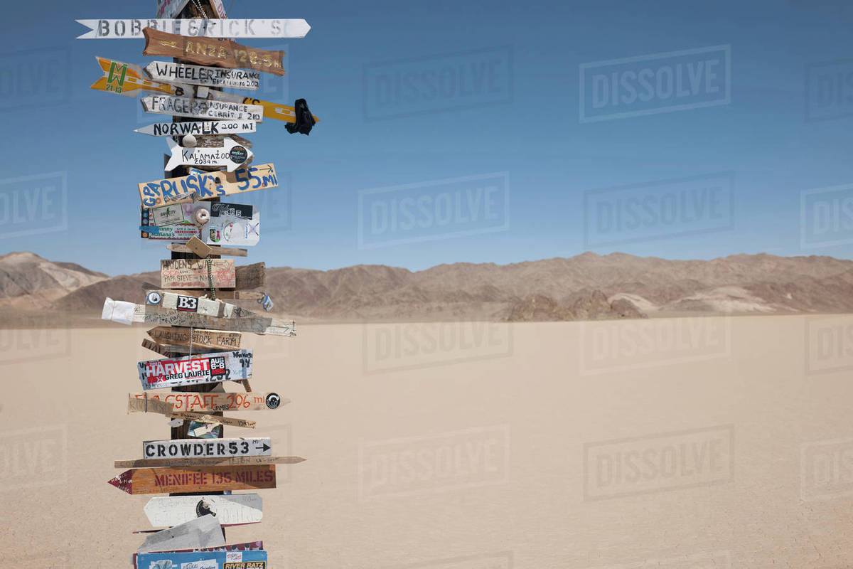 Signpost in desert - Royalty-free Stock Photo | Dissolve