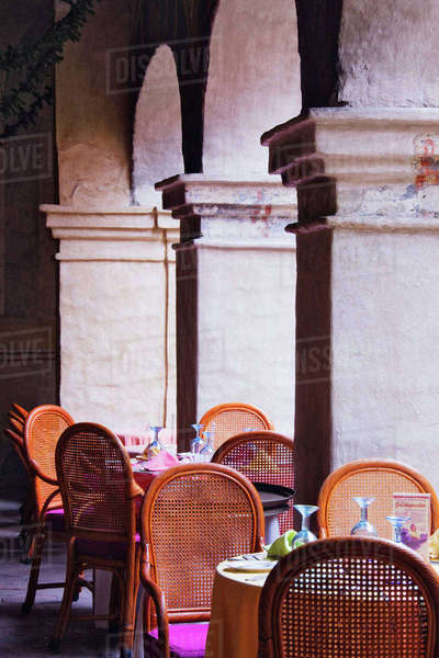 Restaurant Seating Amidst Columns - Royalty-free Stock Photo | Dissolve